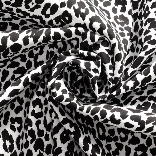 Snow Leopard Print Stretch Twill | Fabric Wholesale Direct
